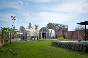 Unconventional architecture of parabolic vaulted ceiling house design