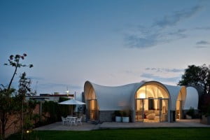 Unconventional architecture of parabolic vaulted ceiling house design