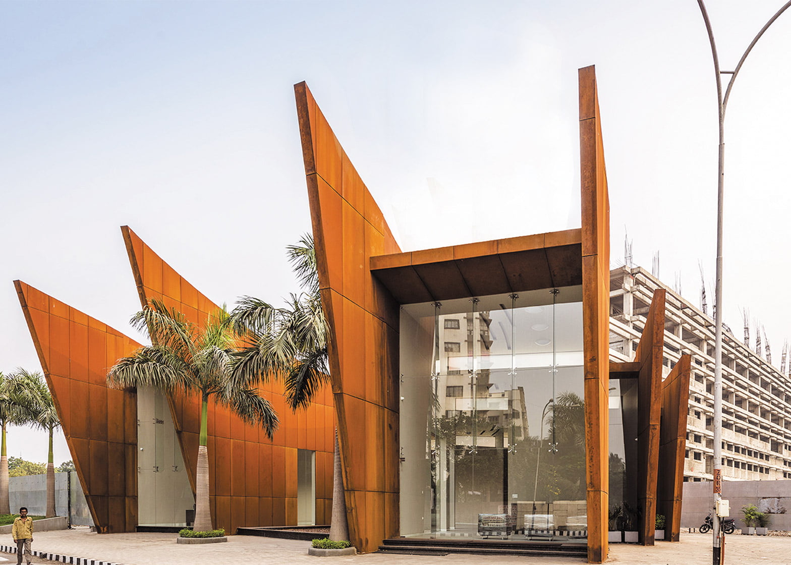 Crescent Rusted Metal Clad Site Office for Developer in Surat - Kadva Corp